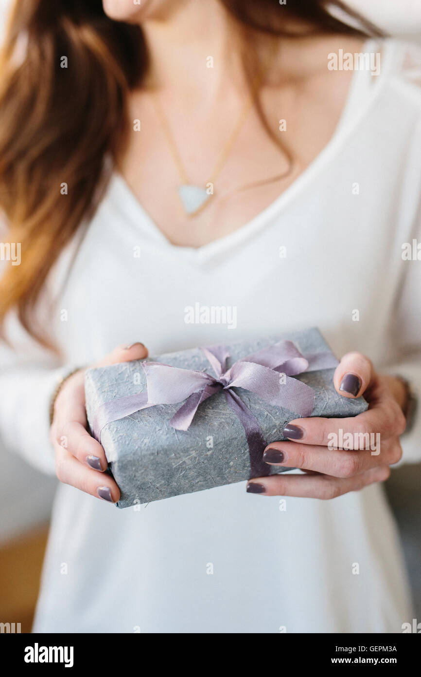 Female holding ribbon hi-res stock photography and images - Alamy