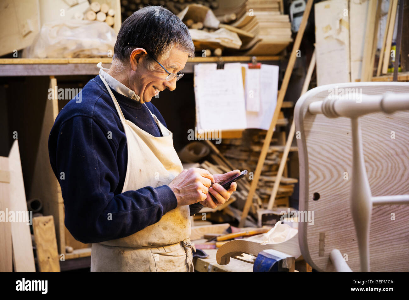 Man standing on chair hi-res stock photography and images - Alamy