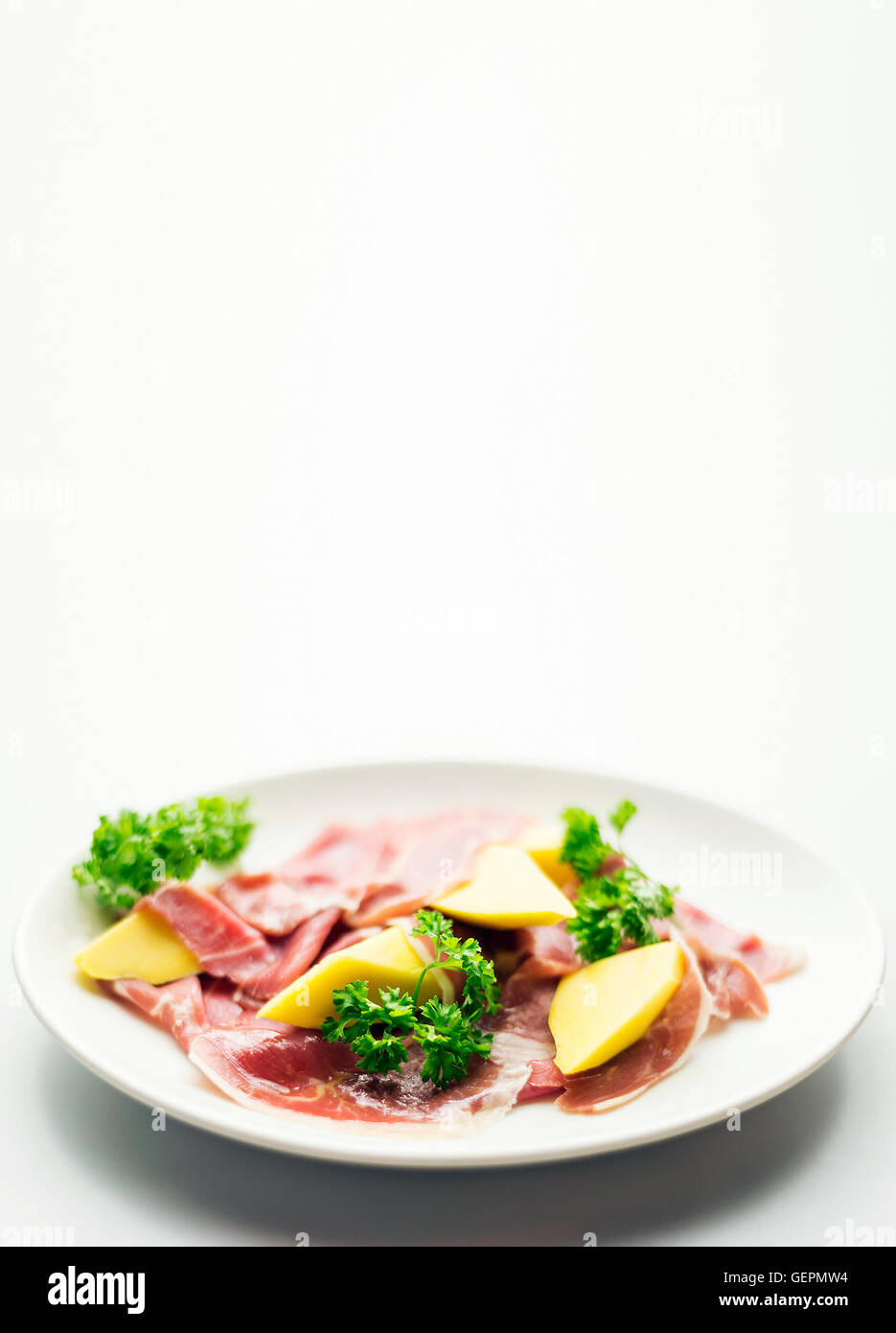 cured parma serrano style ham with fresh mango salad snack starter ...
