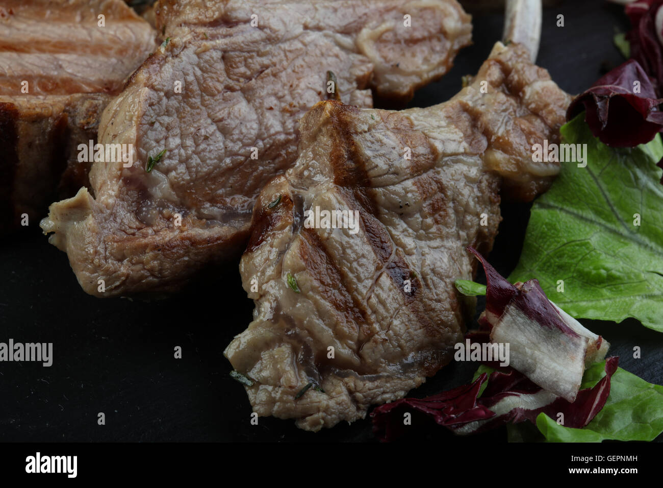 Lamb Frenched Rack grilled rib bone Stock Photo - Alamy