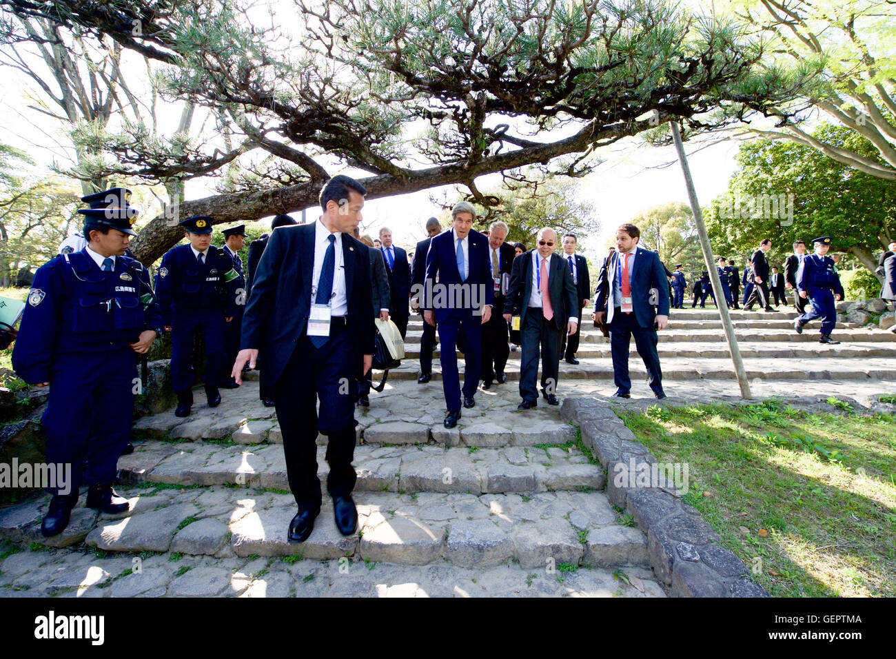 Secretary Kerry Ducks Under a Tree Branch as He Leaves the Hiroshima ...
