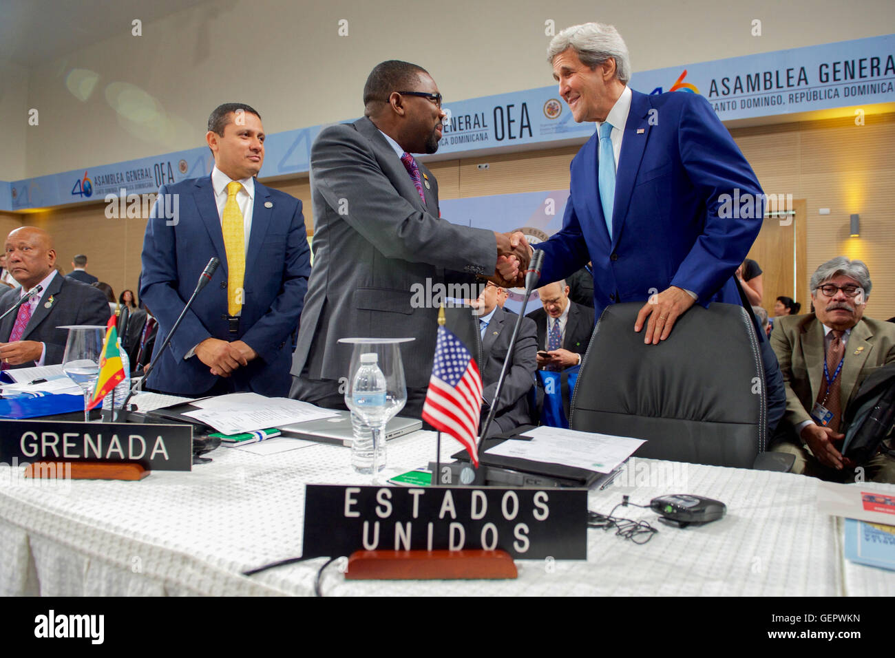 Secretary Kerry Shakes Hands With a Representative of Grenada Before a ...