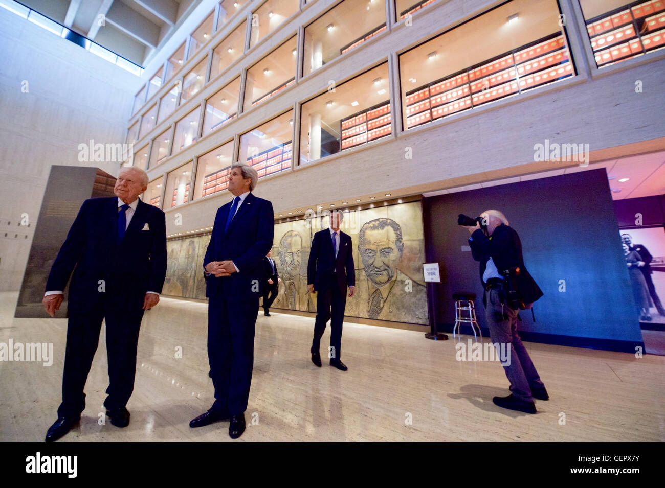 Secretary Kerry Stands in Front of the Banks of Official Papers Stored ...