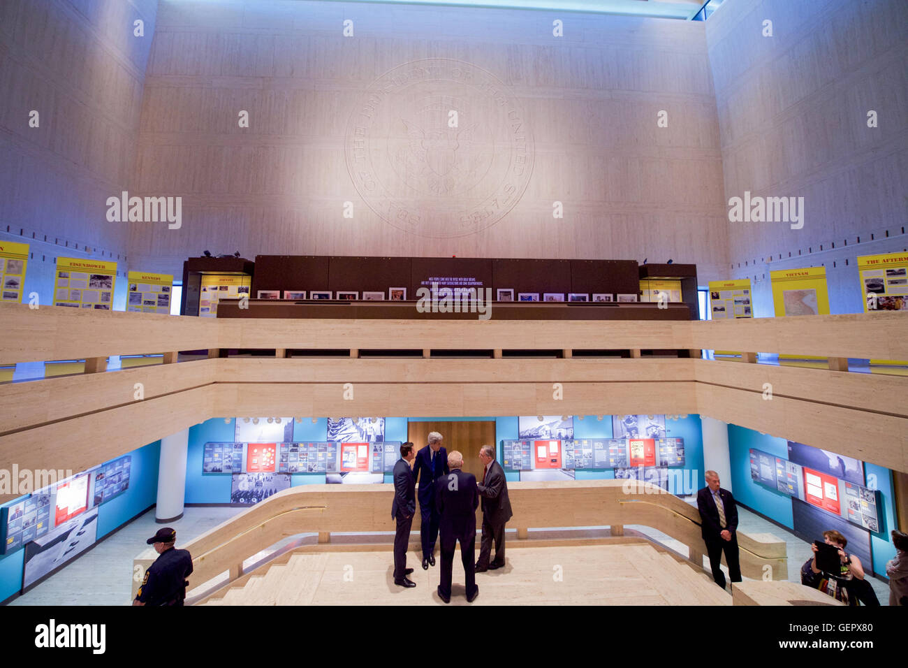 Secretary Kerry Stands in the Atrium of the LBJ Presidential Library at ...