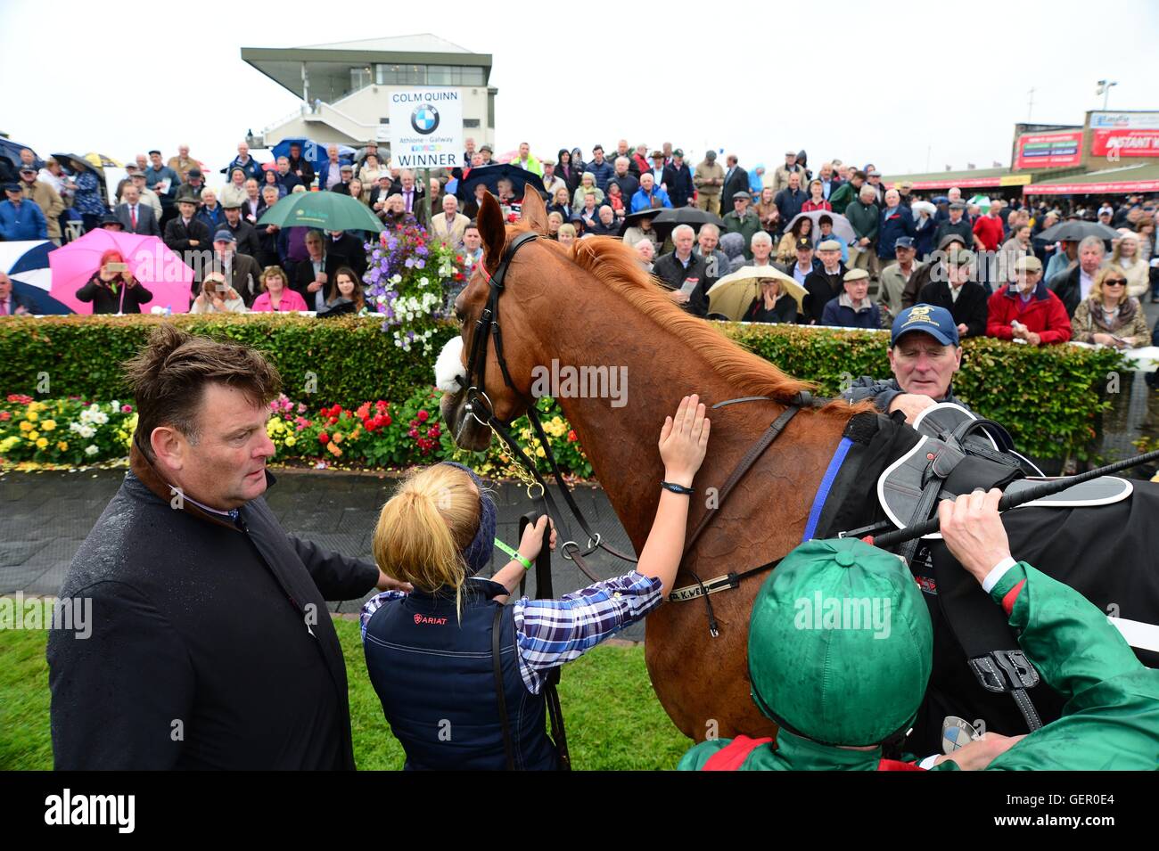Eziyra and jockey Pat Smullen in the winners enclosure after victory in ...