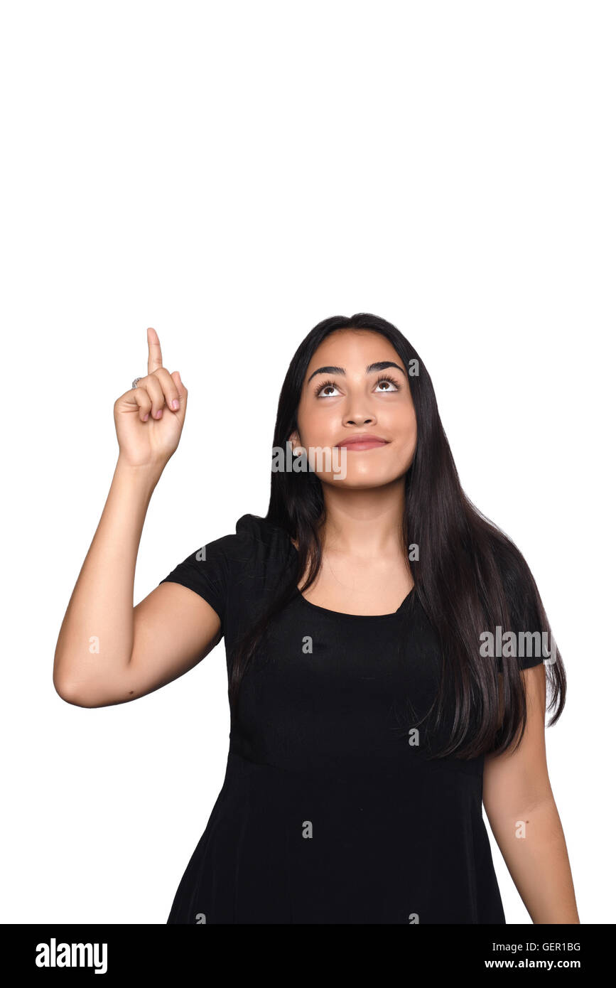 Young beautiful woman pointing at white background Stock Photo - Alamy