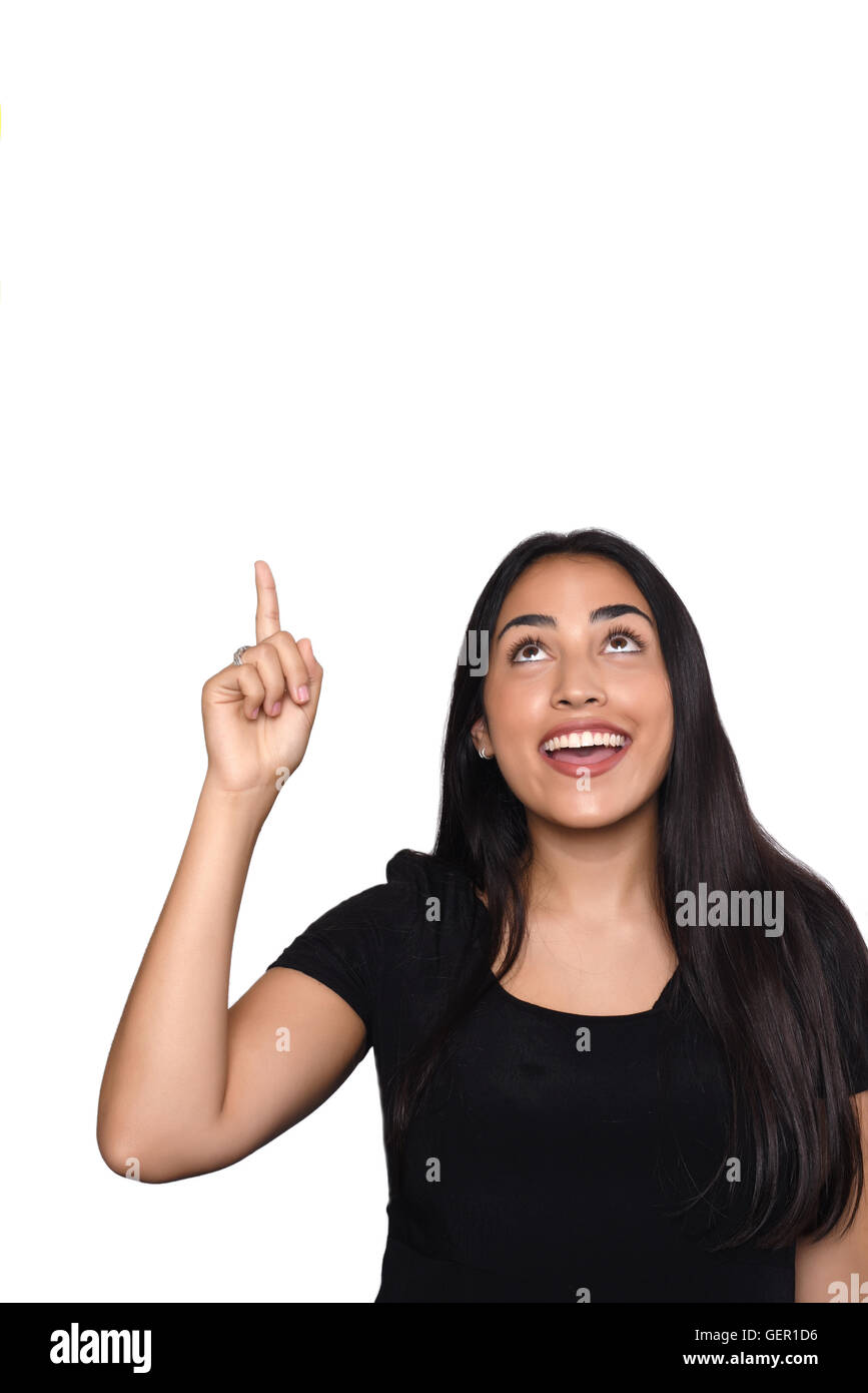 Young beautiful woman pointing at white background Stock Photo - Alamy