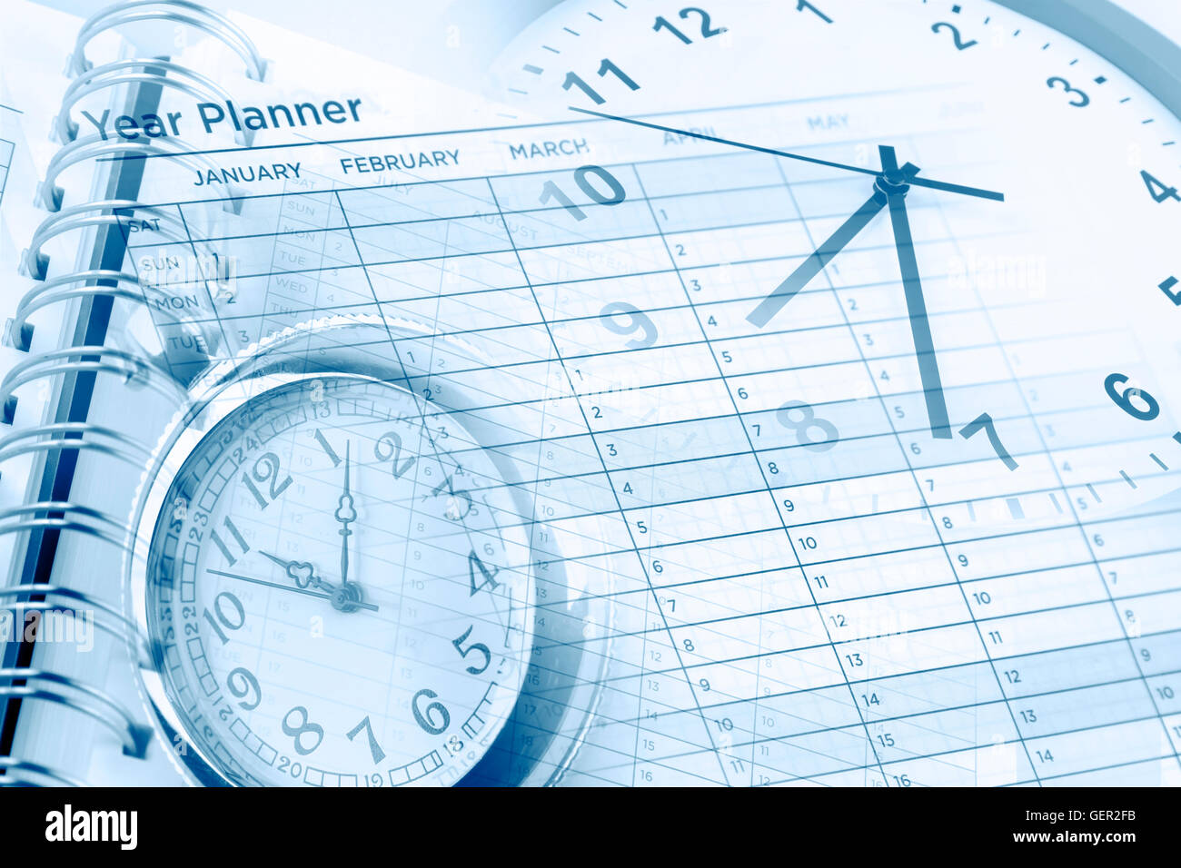 Clocks, calendar page and year planner Stock Photo - Alamy