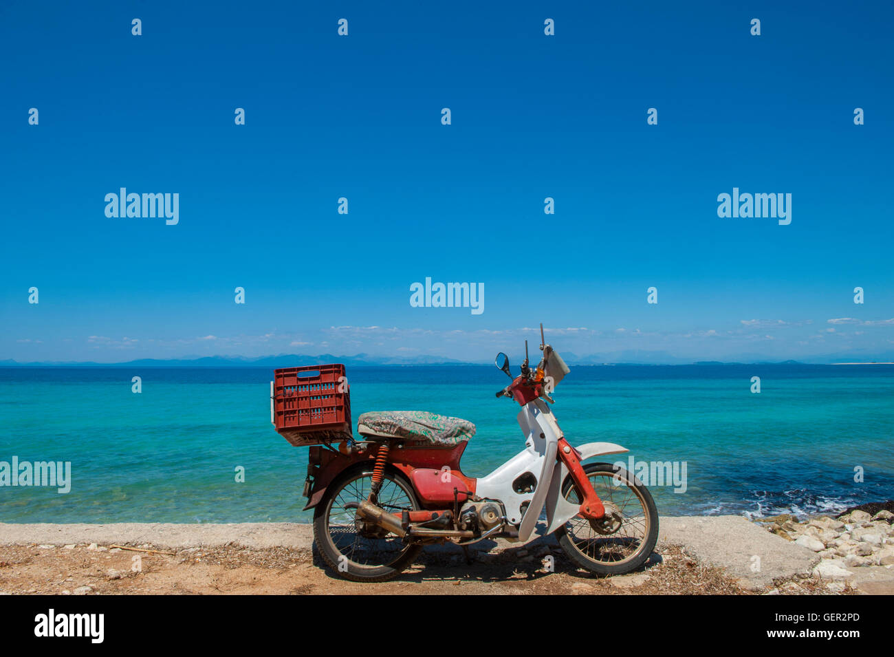 Moped on the beach hi-res stock photography and images - Alamy