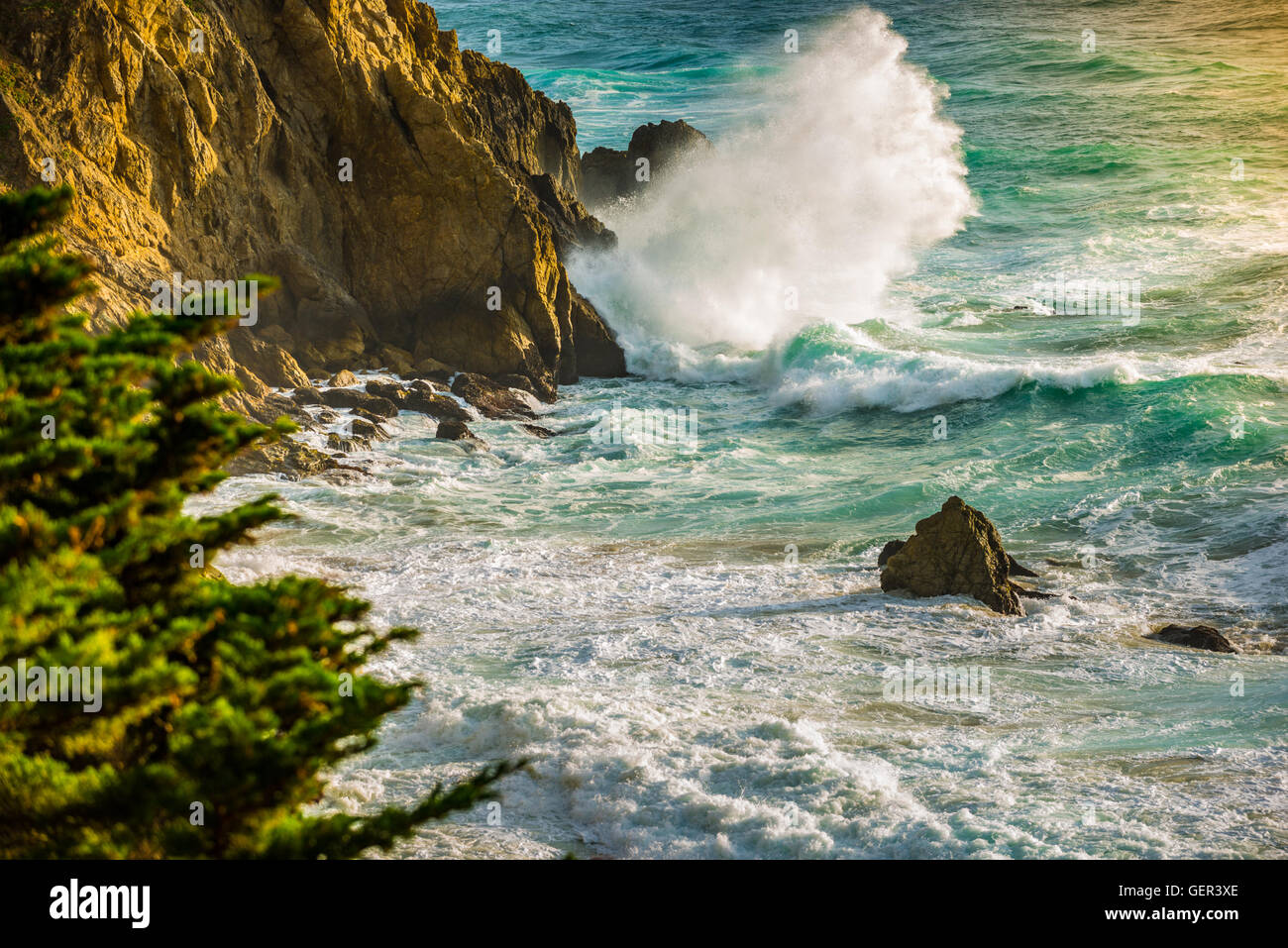 Wave Crashing onto the rocky shore of Pacific Ocean California Stock ...