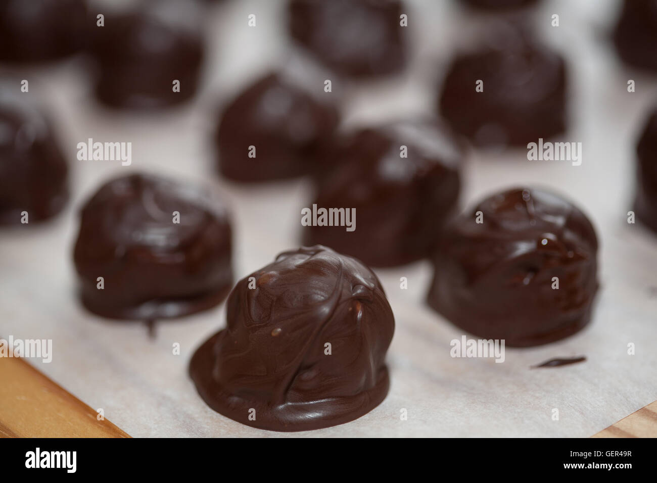 Hand dipped chocolates hi-res stock photography and images - Alamy