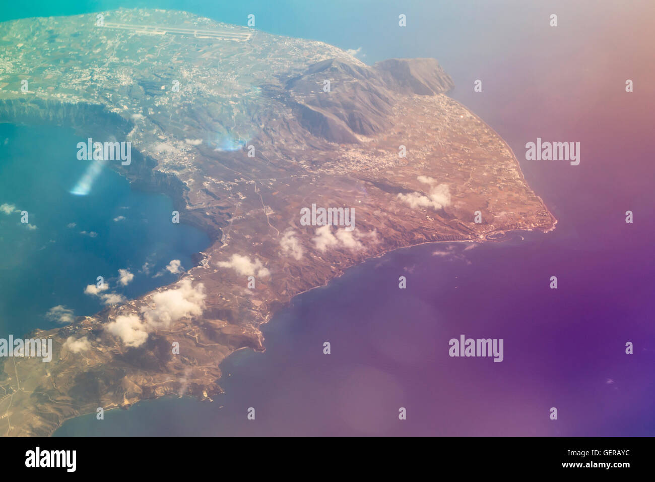 Greek Island Santorini in Aegean sea, aerial view from flight altitude ...