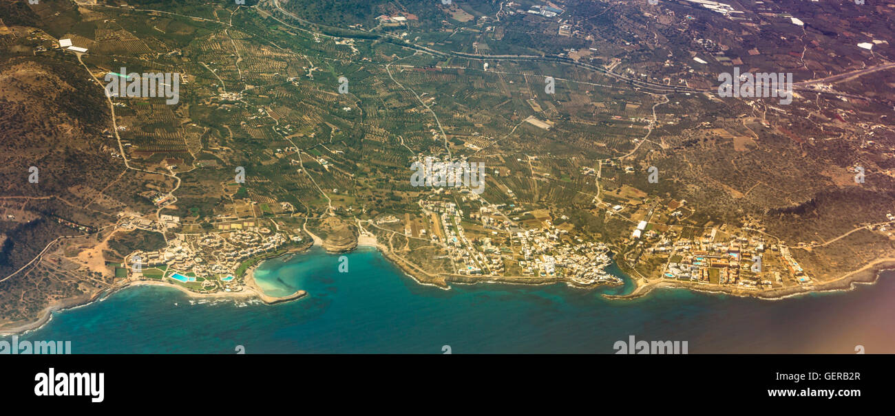 Seaside view of resort Crete island with hotels and beaches, aerial ...