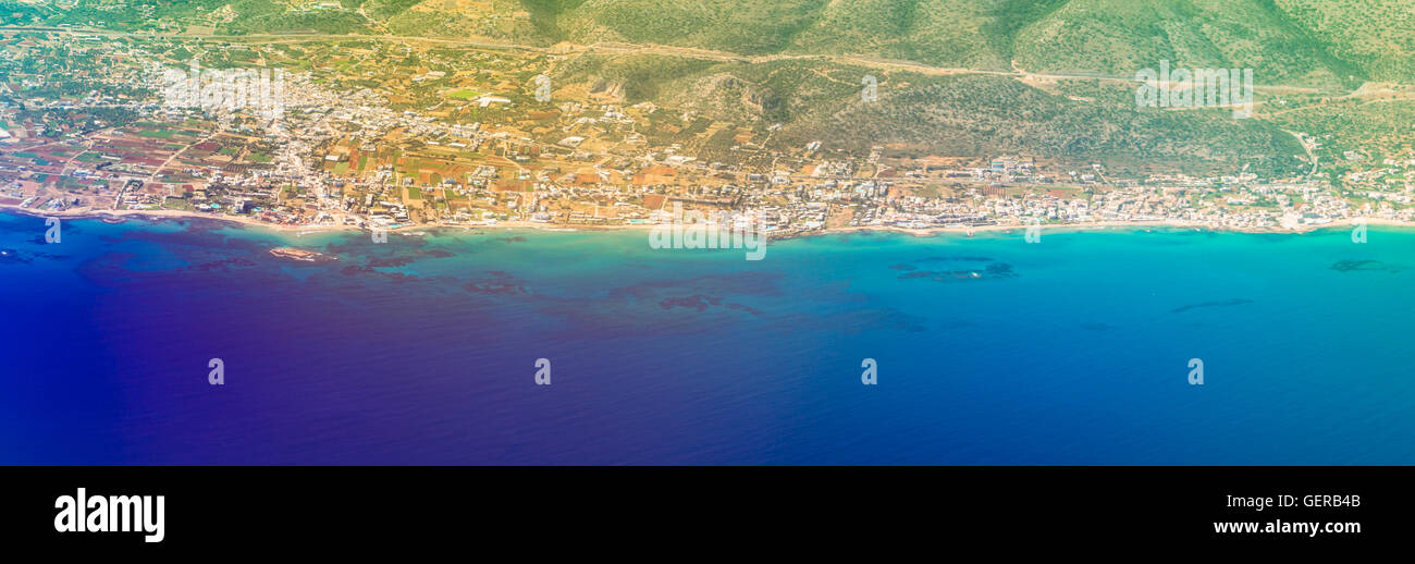 Seaside view of resort Crete island with hotels and beaches, aerial ...