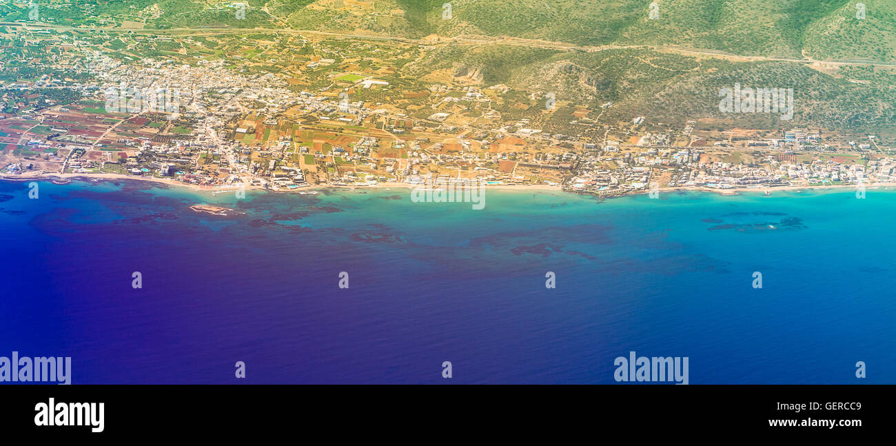 Seaside view of resort Crete island with hotels and beaches, aerial ...