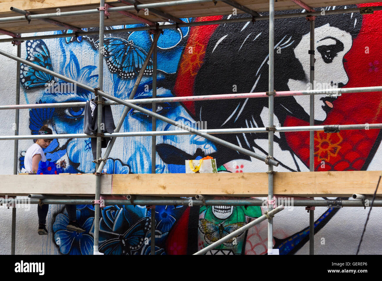 Street artist painting at Upfest (street art festival) in Bedminster ...