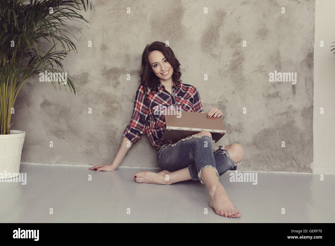 Barefoot girl laptop hi-res stock photography and images - Alamy