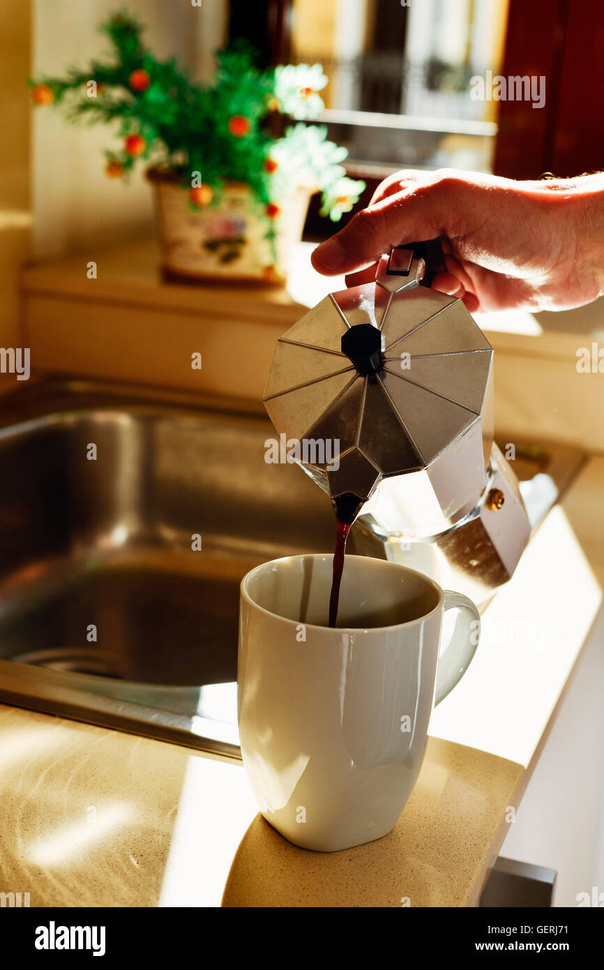 Man serving coffee hi-res stock photography and images - Alamy