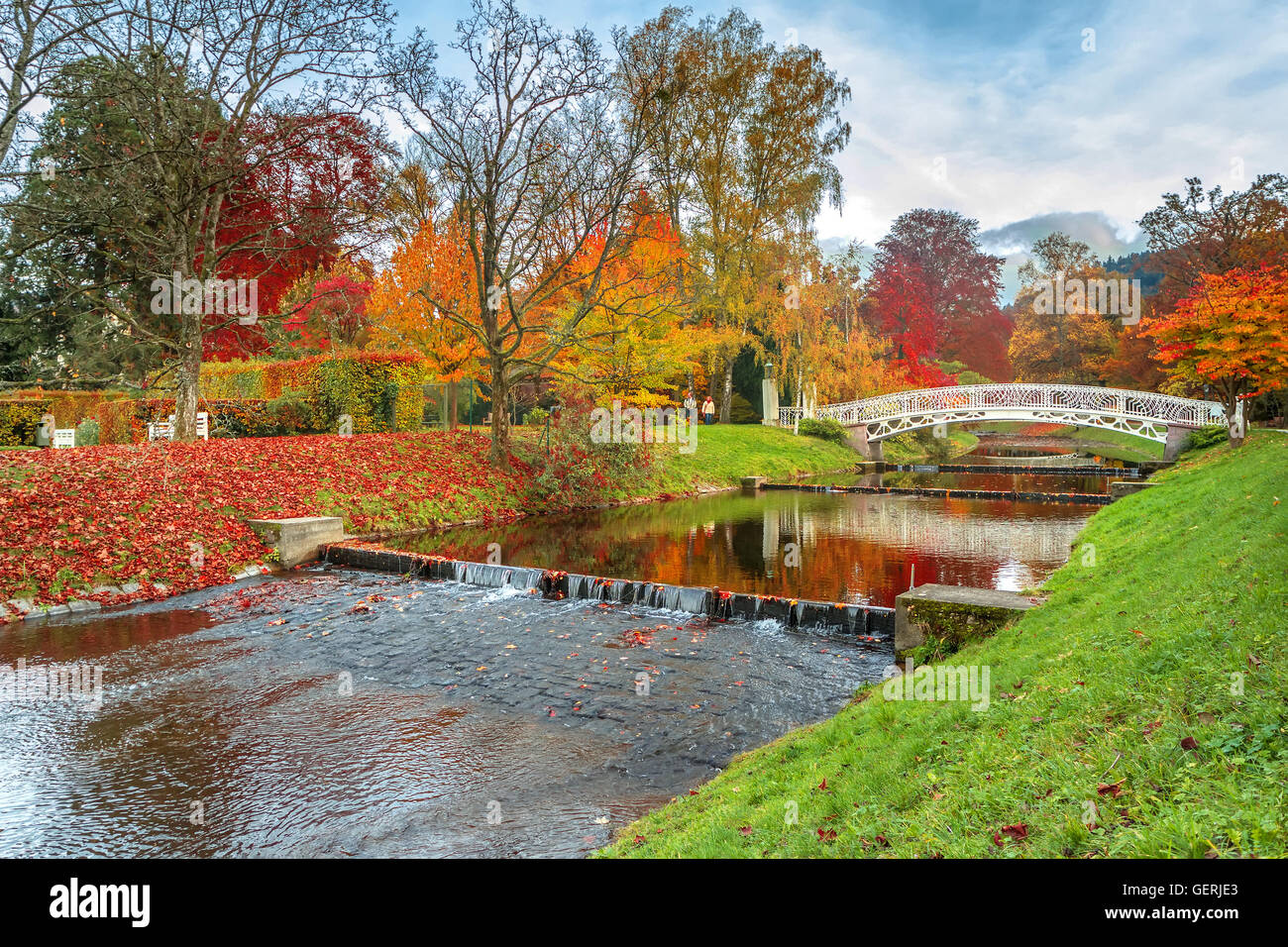 Beautiful autumn landscape with bridge and reflection in river Stock ...
