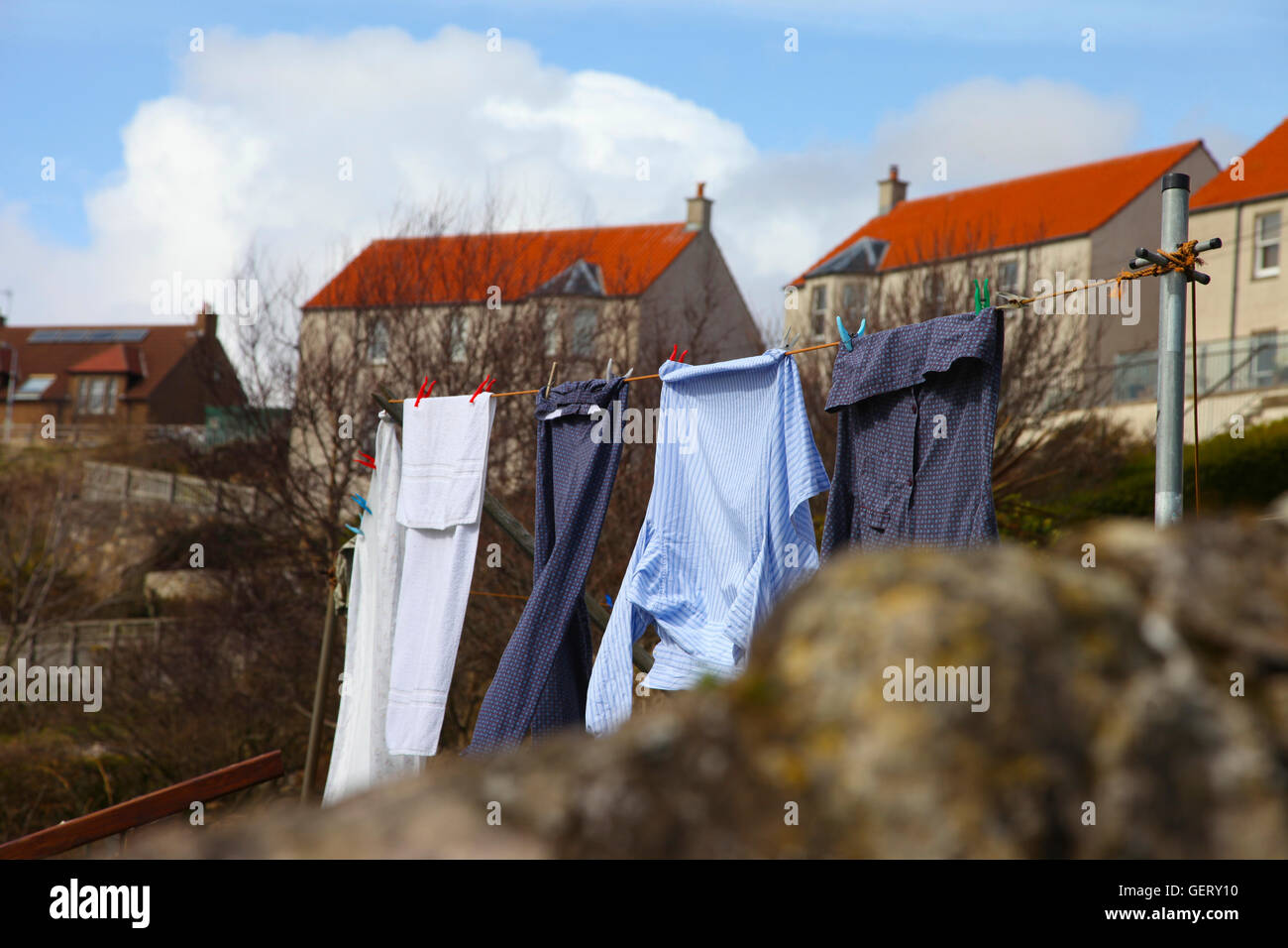 A washing line with pyjamas on Stock Photo - Alamy
