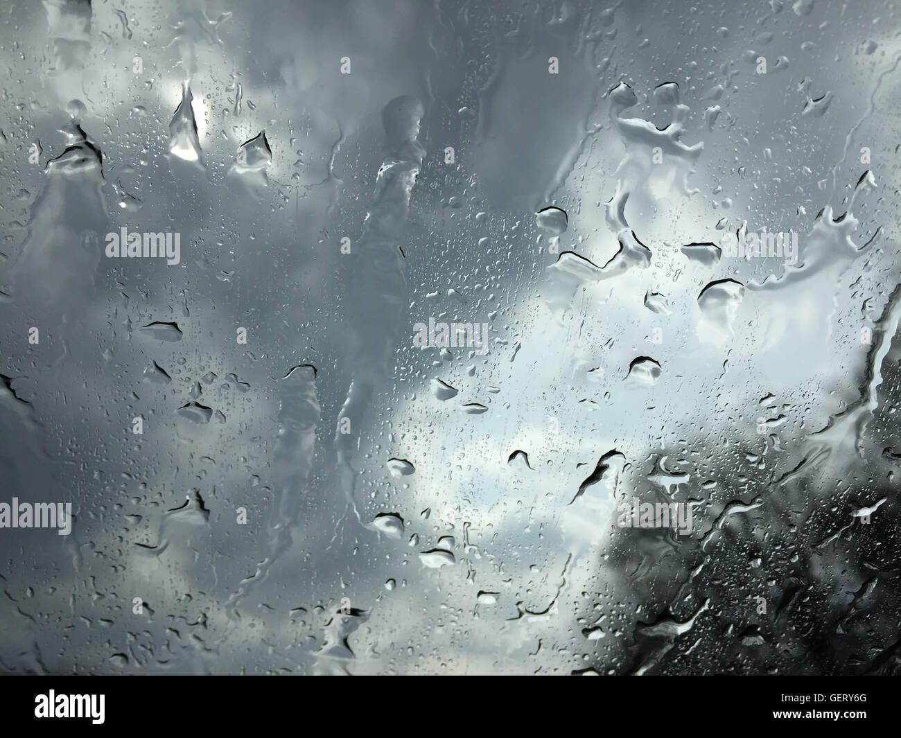 Auto windshield during rain storm Stock Photo - Alamy