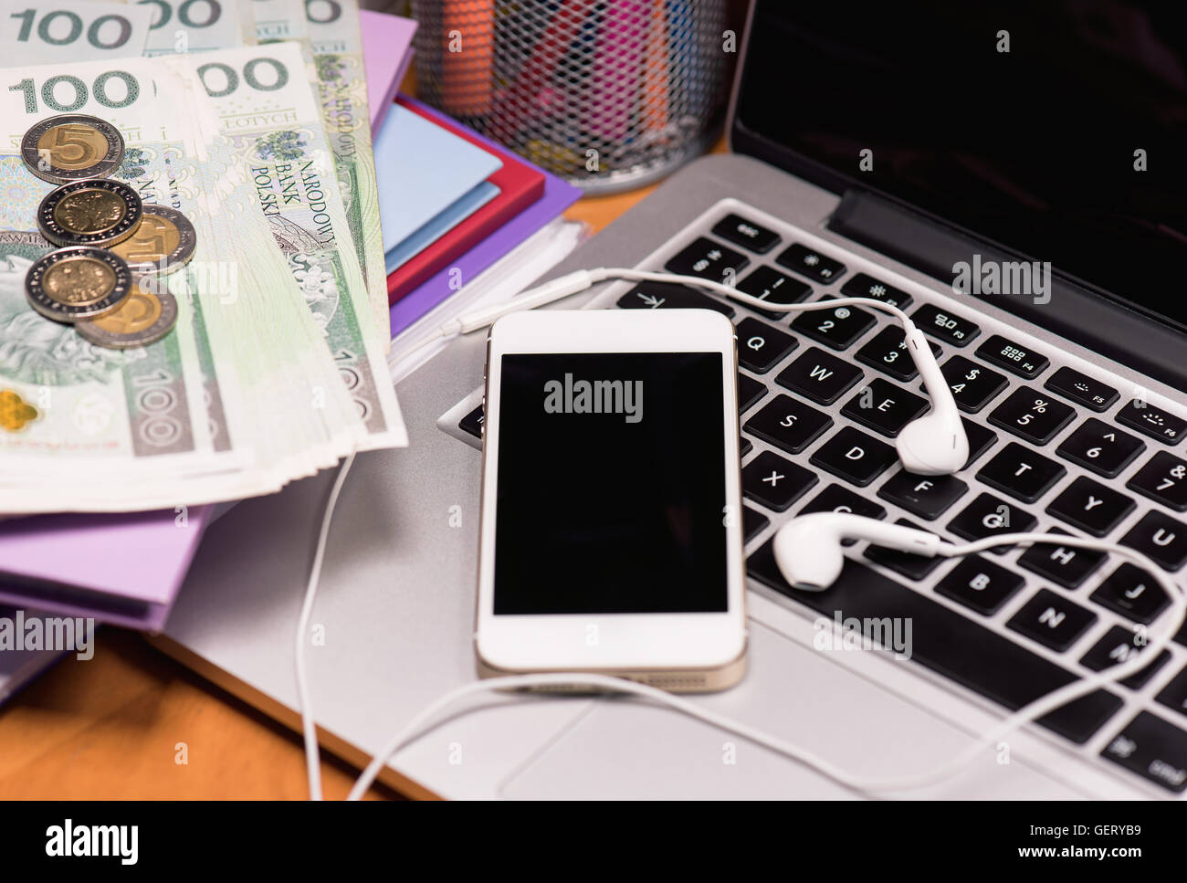 Money and electronic devices Stock Photo - Alamy