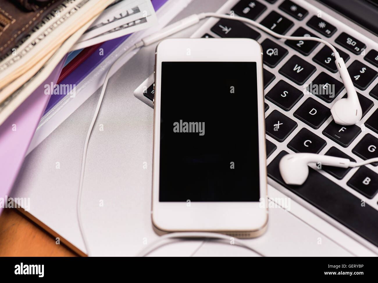 Money and electronic devices Stock Photo - Alamy