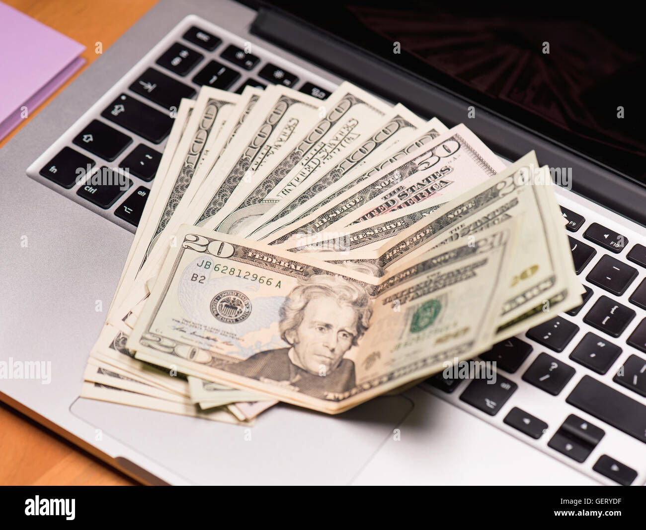 Money and electronic devices Stock Photo - Alamy
