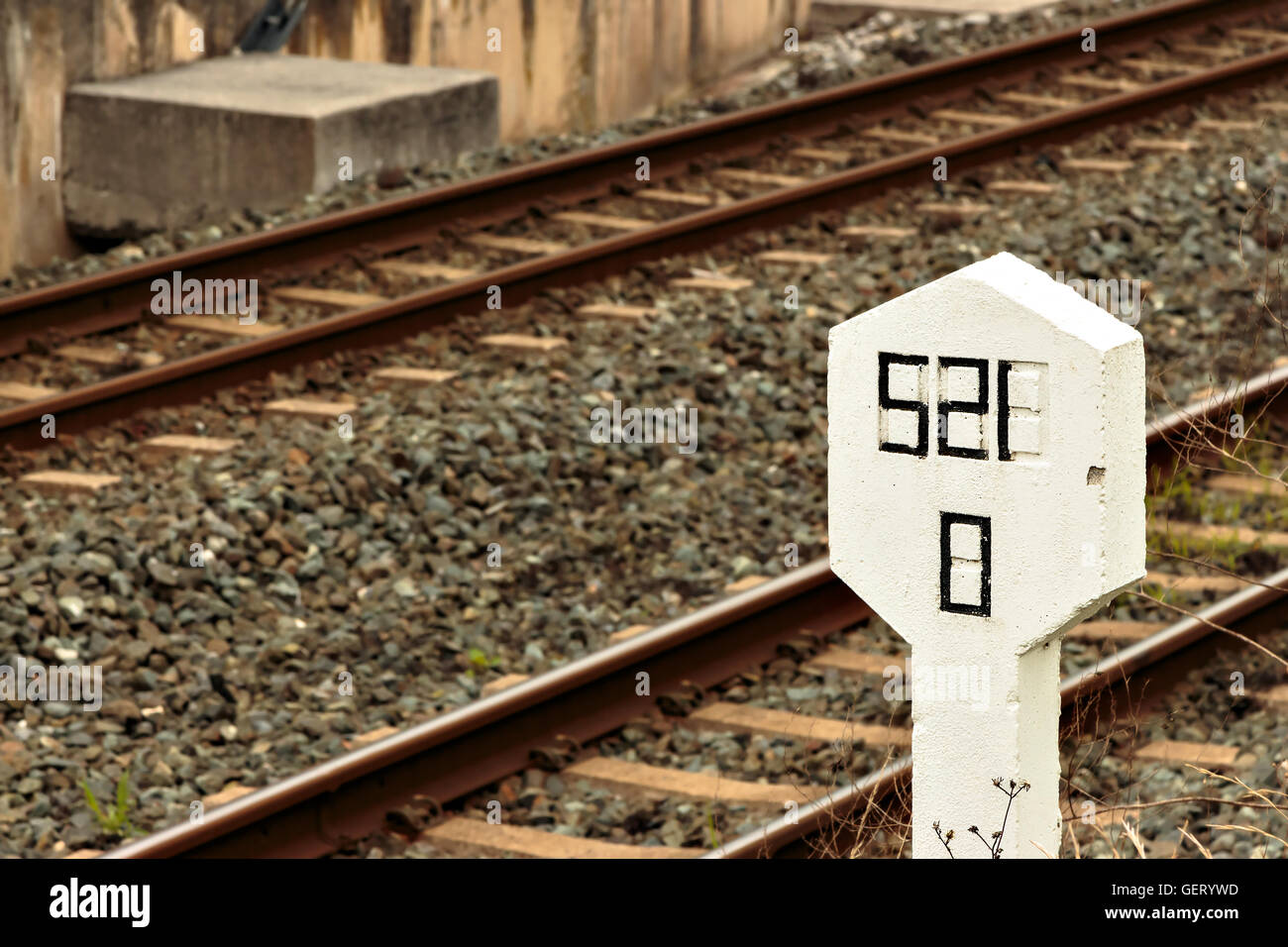 Stone signal in the railway line. Horizontal image Stock Photo - Alamy