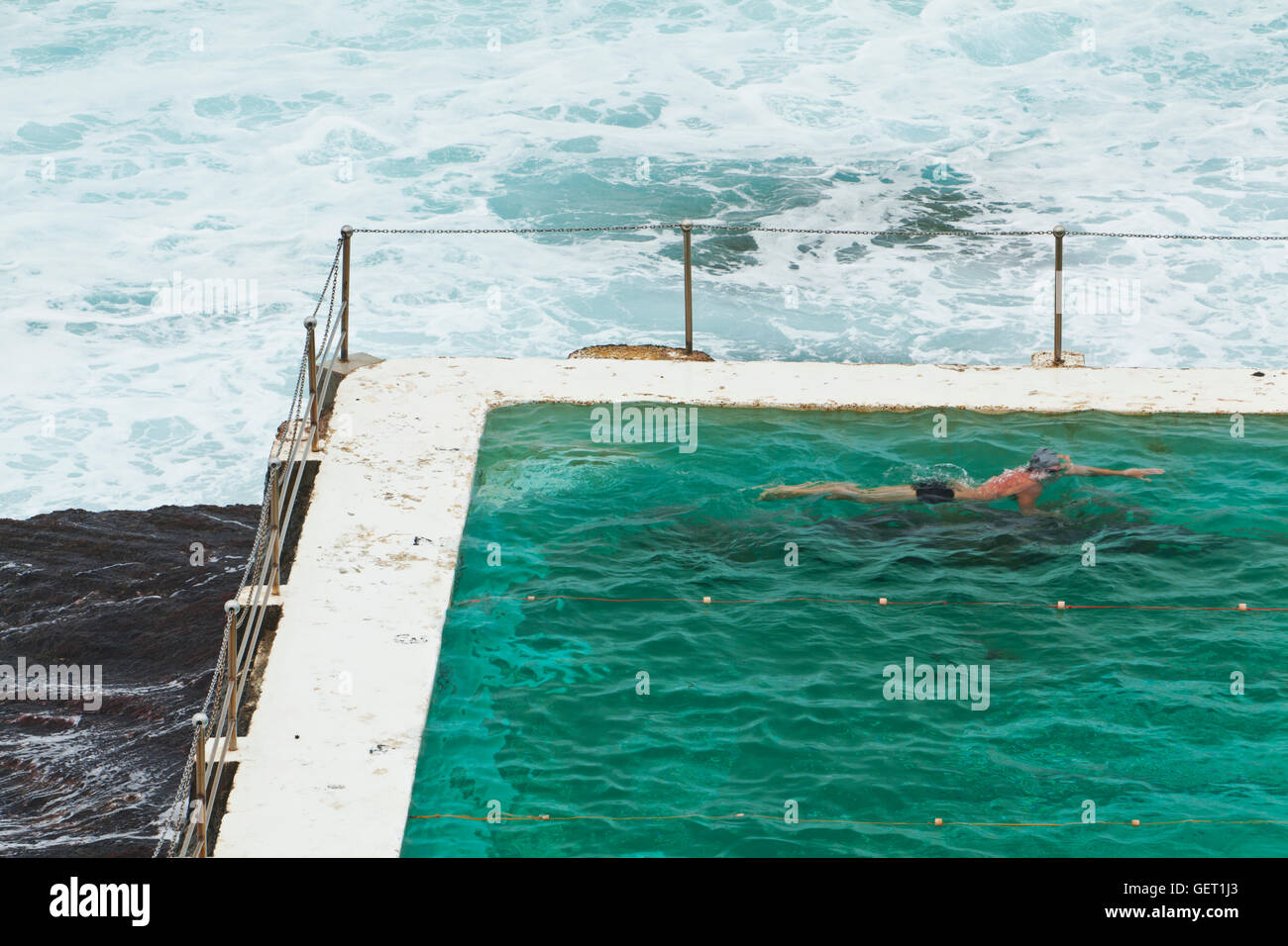 A man swimming at Icebergs swimming pool on Bondi beach Stock Photo - Alamy