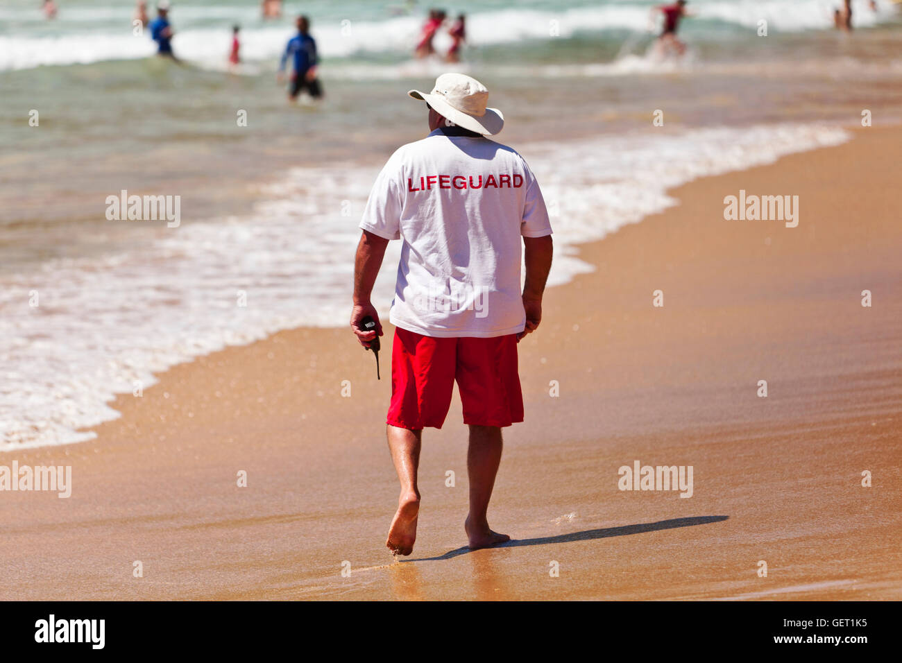 A lifeguard patrolling on Manly beach Stock Photo - Alamy