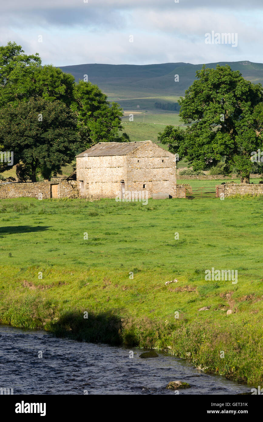 A Beautiful Stone Barn in a Field Alongside the River Ure in Bainbridge ...