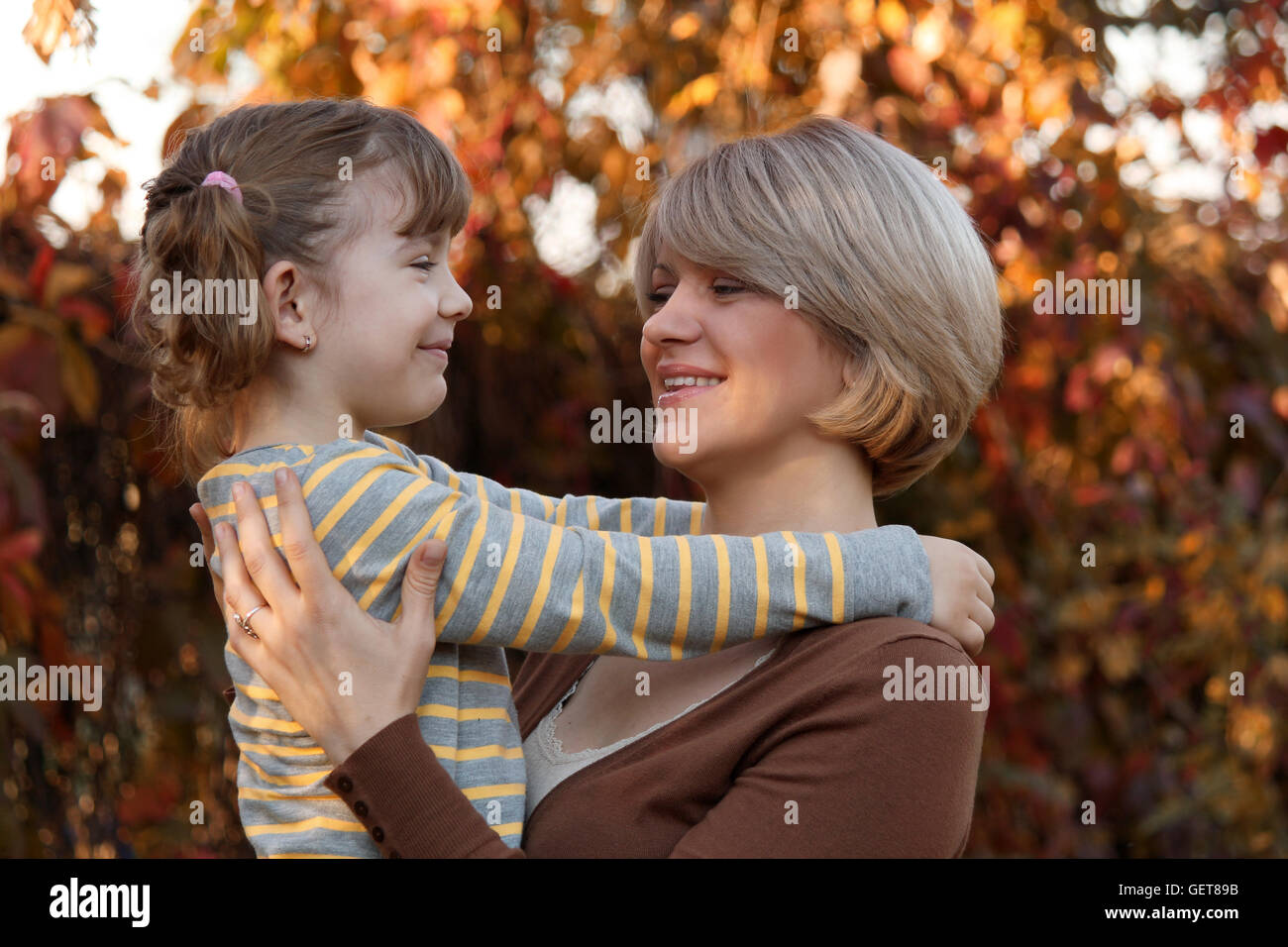 happy mother and daughter family scene Stock Photo - Alamy