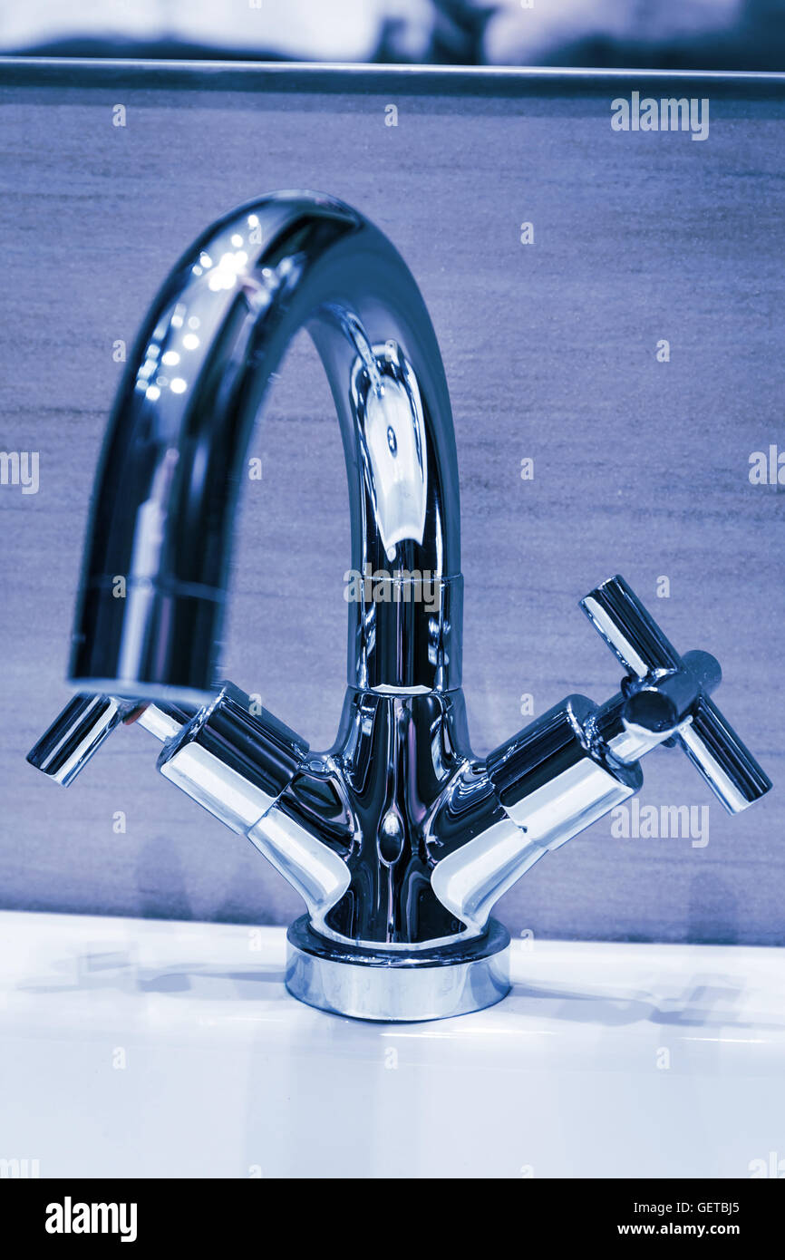 water tap with modern design in bathroom Stock Photo - Alamy