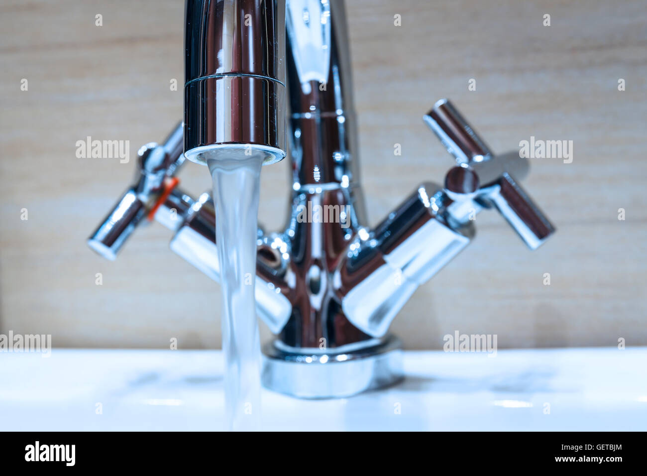 water tap with modern design in bathroom Stock Photo - Alamy