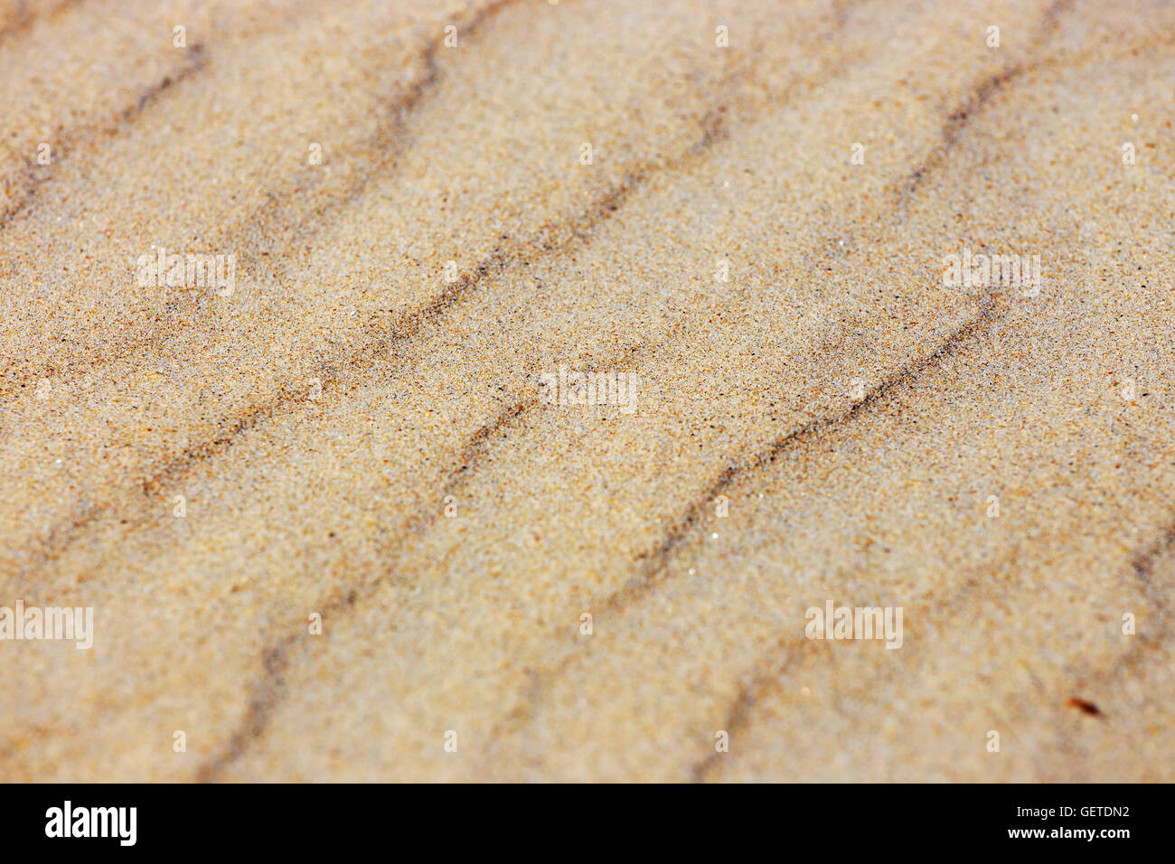 Lines in the sand of a beach, close up Stock Photo - Alamy