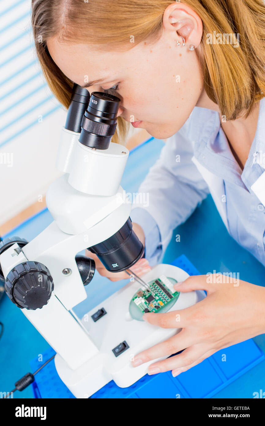 Woman in modern electronics laboratory Stock Photo - Alamy