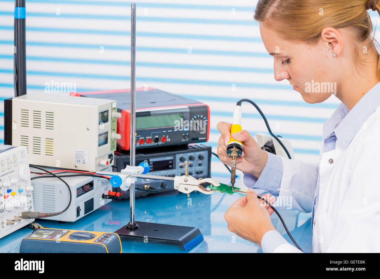 Woman in modern electronics laboratory Stock Photo - Alamy