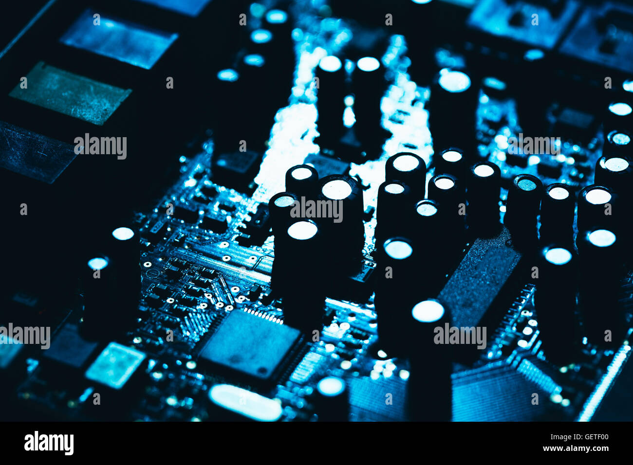 computer motherboard in blue dark background close-up Stock Photo - Alamy