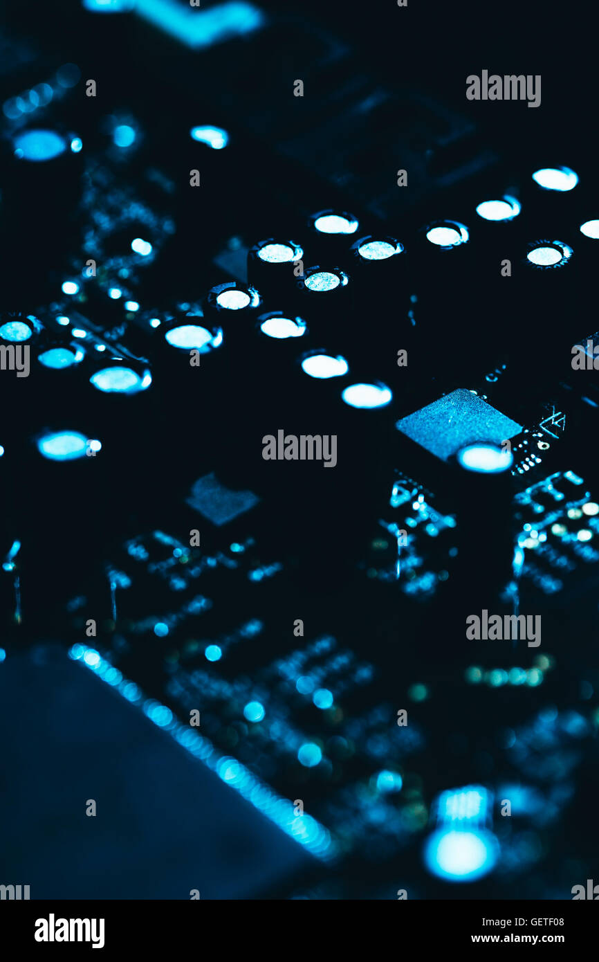 computer motherboard in blue dark background close-up Stock Photo - Alamy