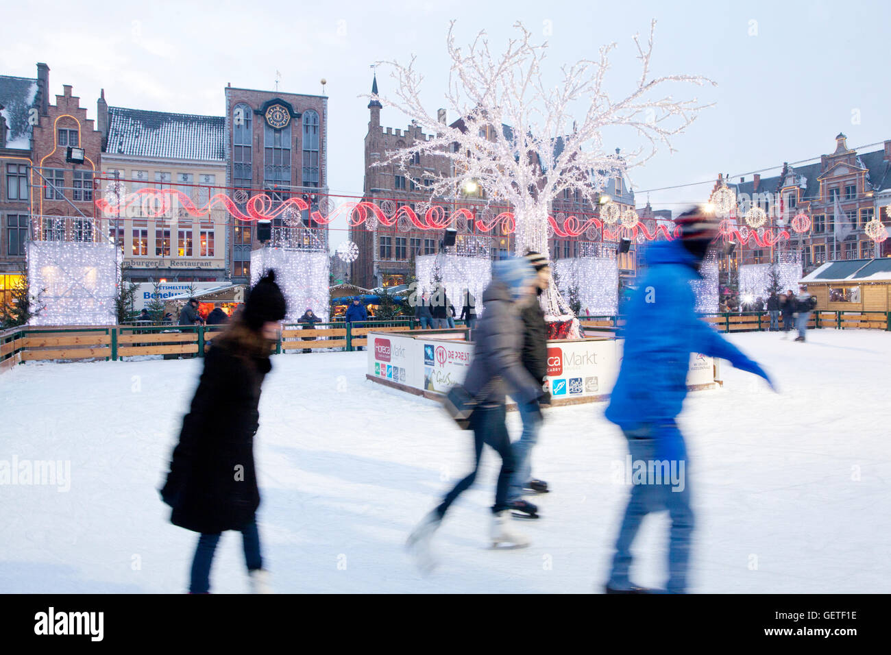 Skaters on the Christmas ice rink in the main square in the centre of ...