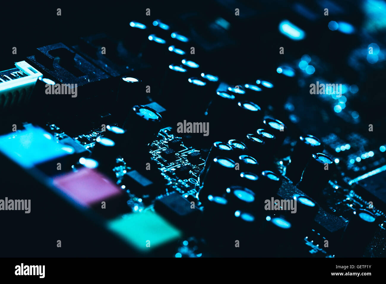 computer motherboard in blue dark background close-up Stock Photo - Alamy
