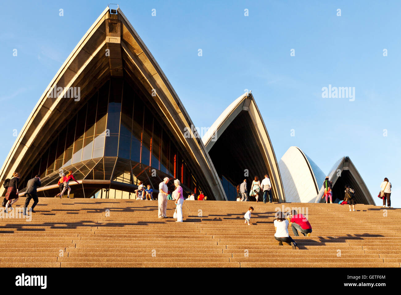 People on the steps of the Sydney opera House at sunset Stock Photo - Alamy