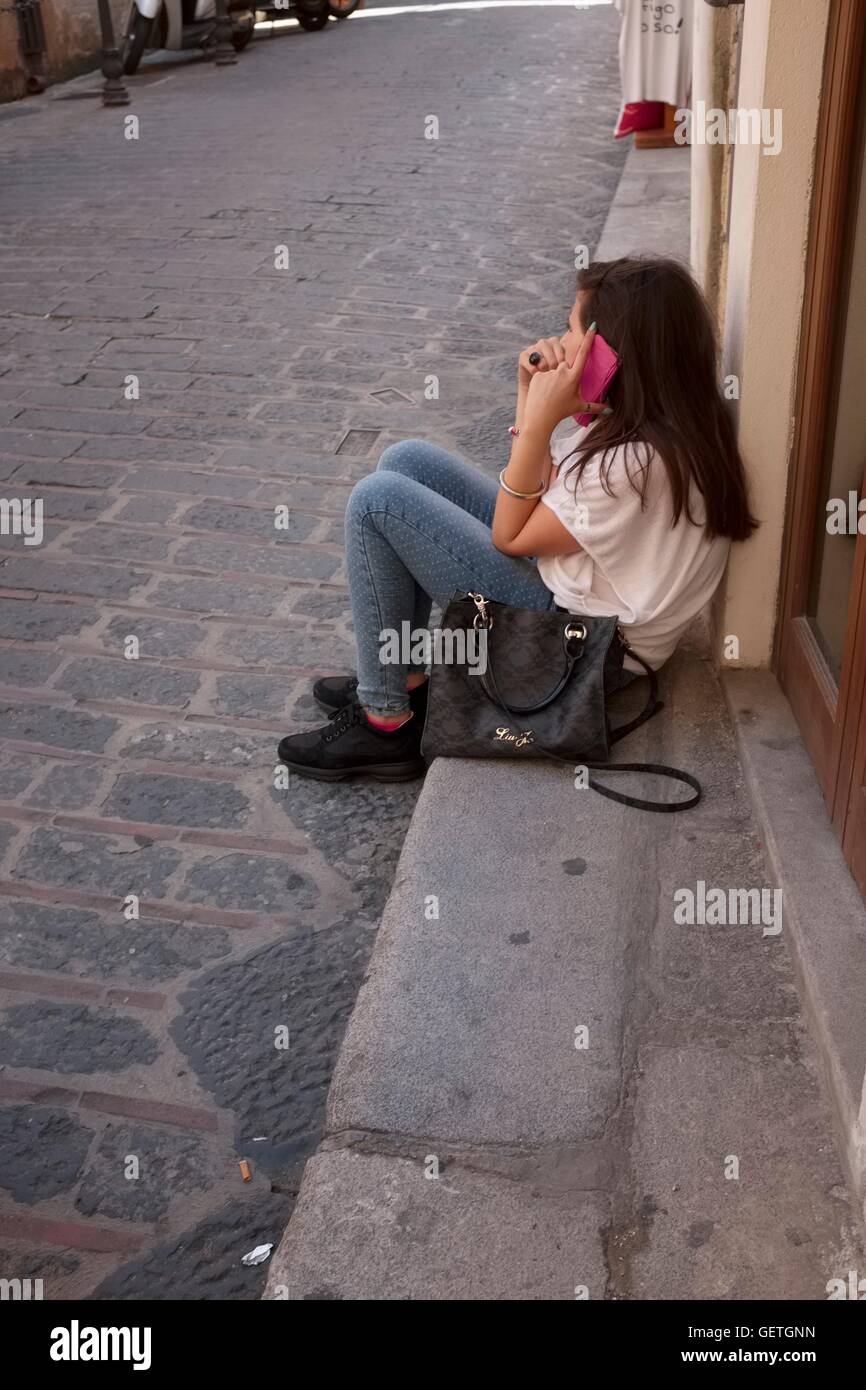 Sitting On Curb High Resolution Stock Photography and Images - Alamy
