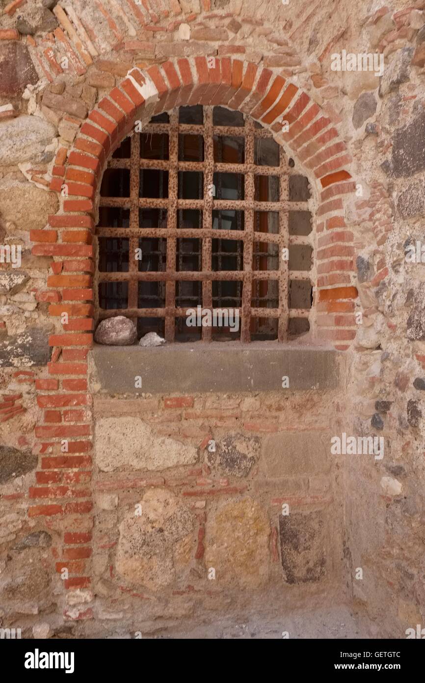 Brick wall and barred window Stock Photo - Alamy