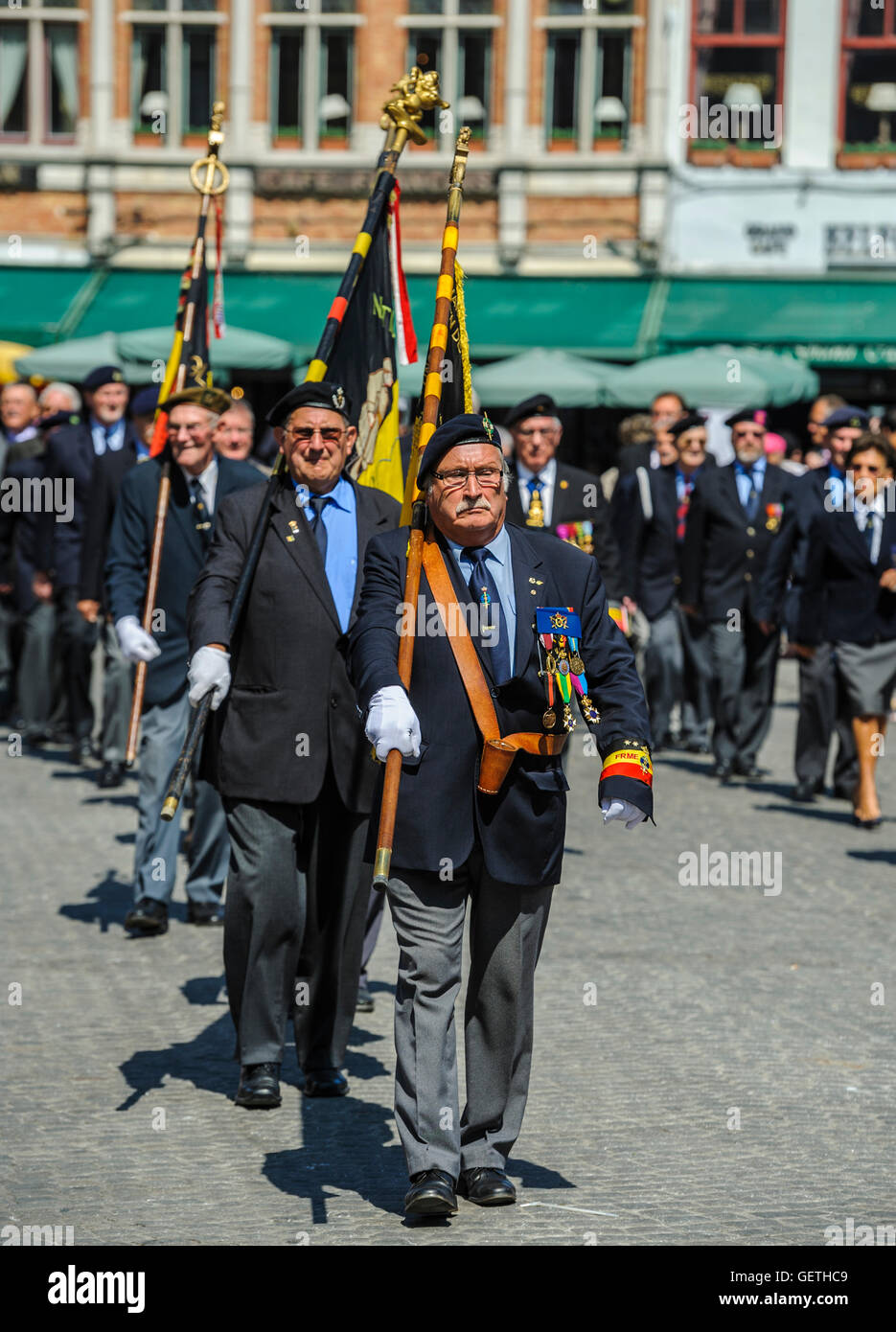 World War 2 veterans march behind a band in the Grote Markt as part of ...