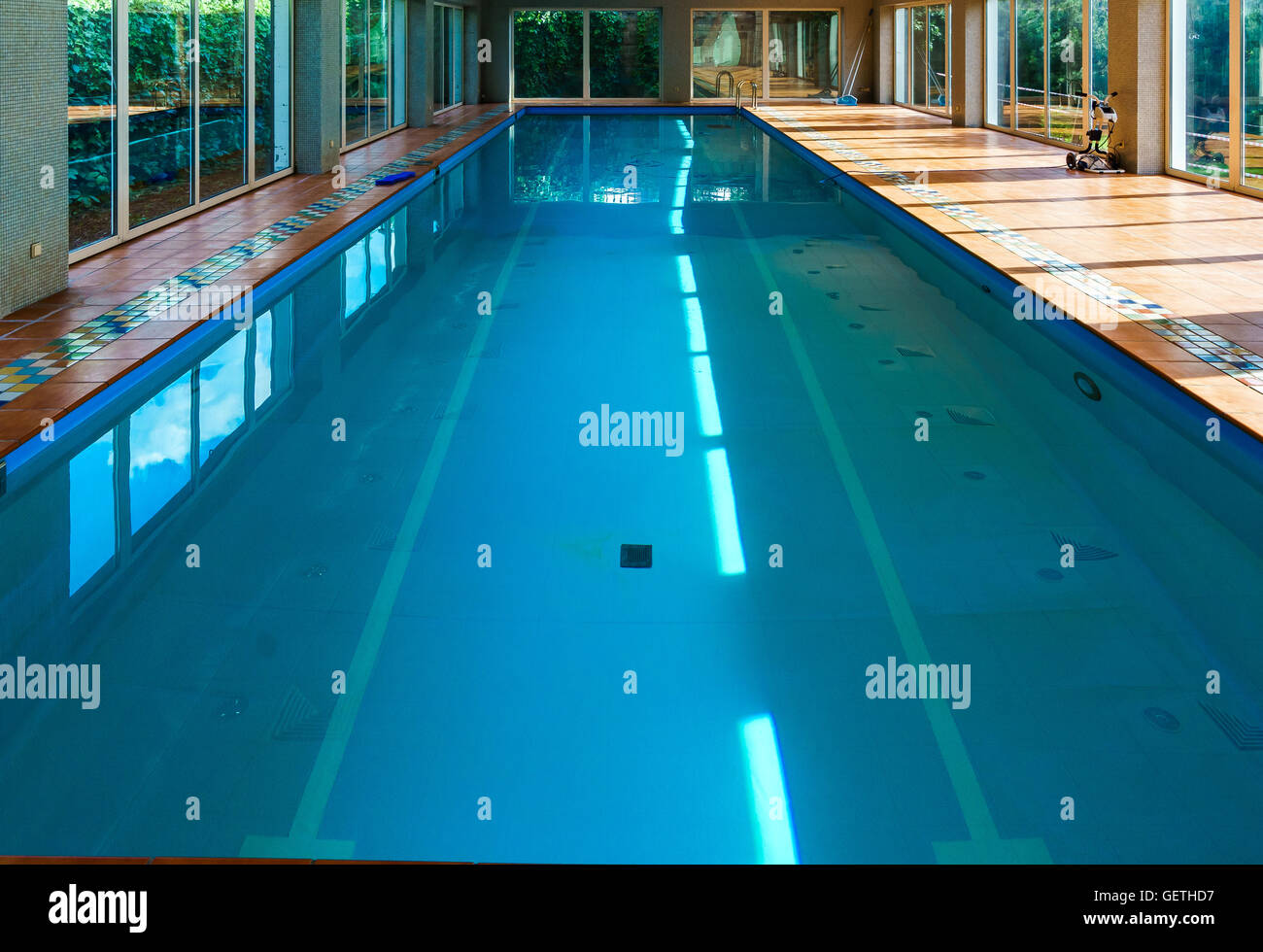 Long covered swimmimg pool on resort, luxury residential Stock Photo ...