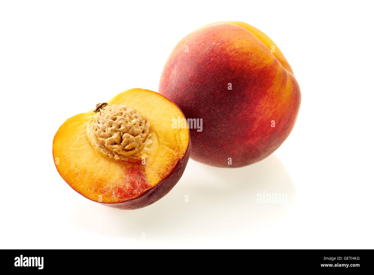 Whole half slices ripe Cut Out Stock Images & Pictures - Alamy