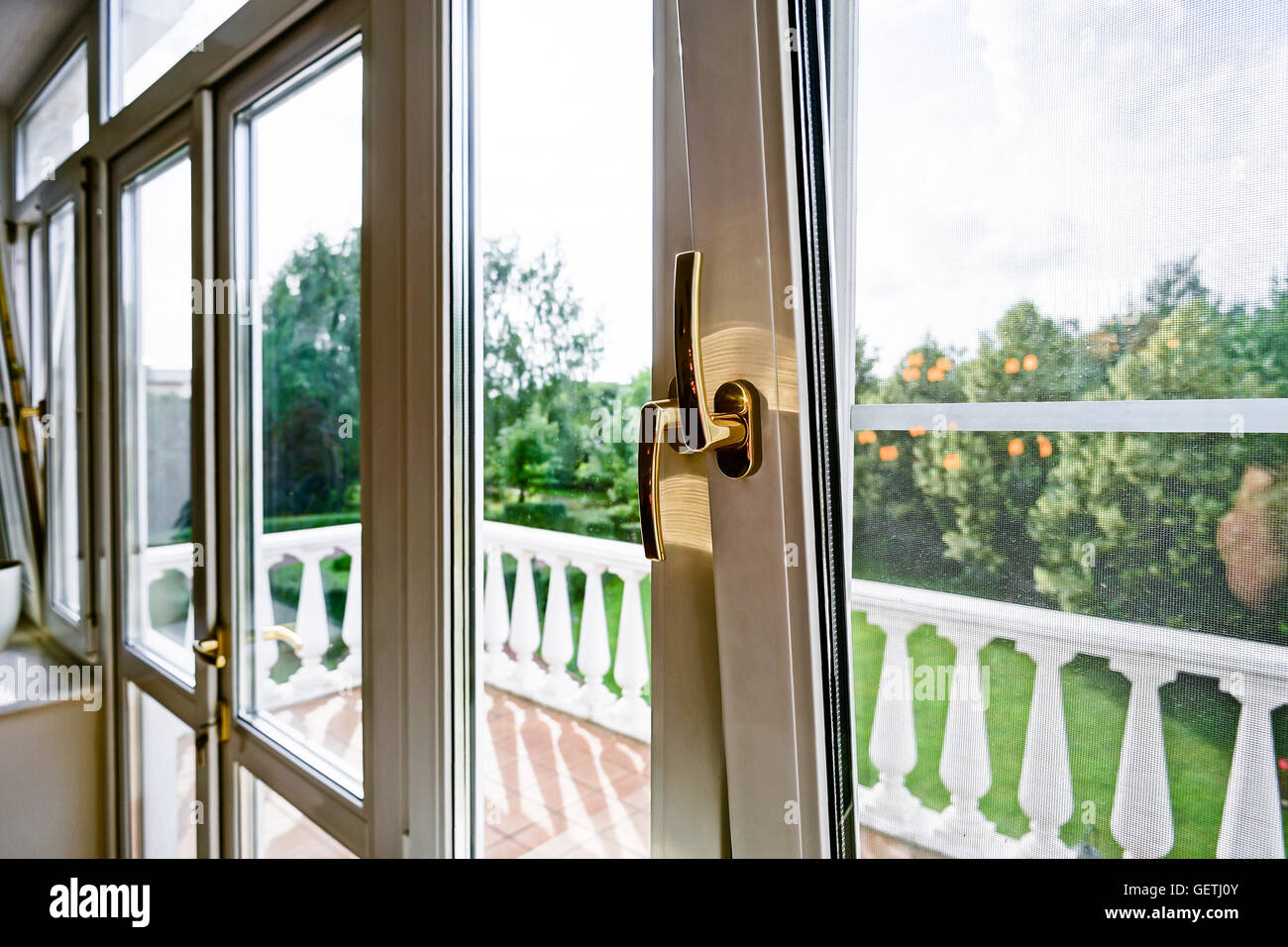 New pvc windows in old-styled interior, view from the inside Stock ...