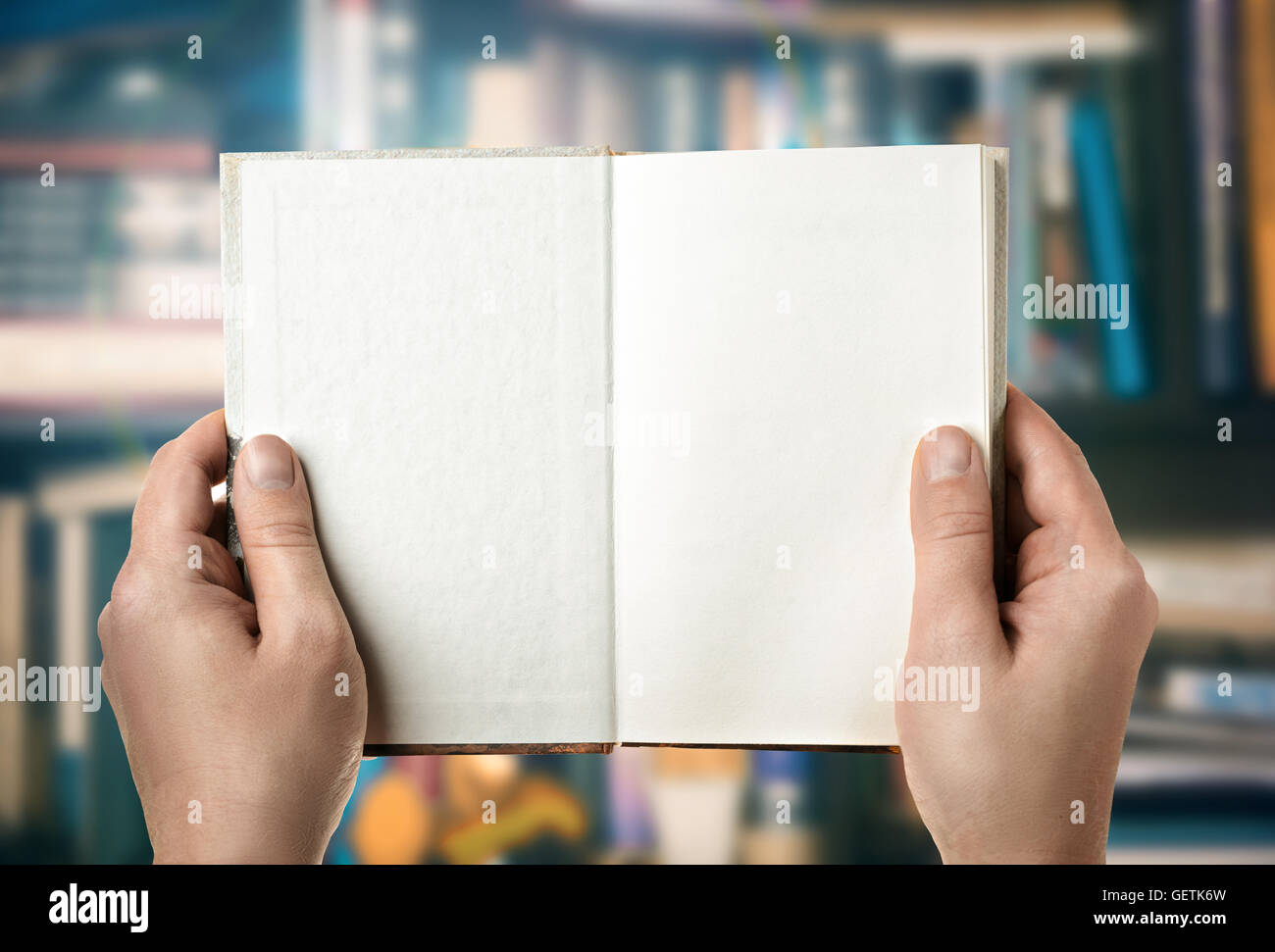 Hands book library hi-res stock photography and images - Alamy